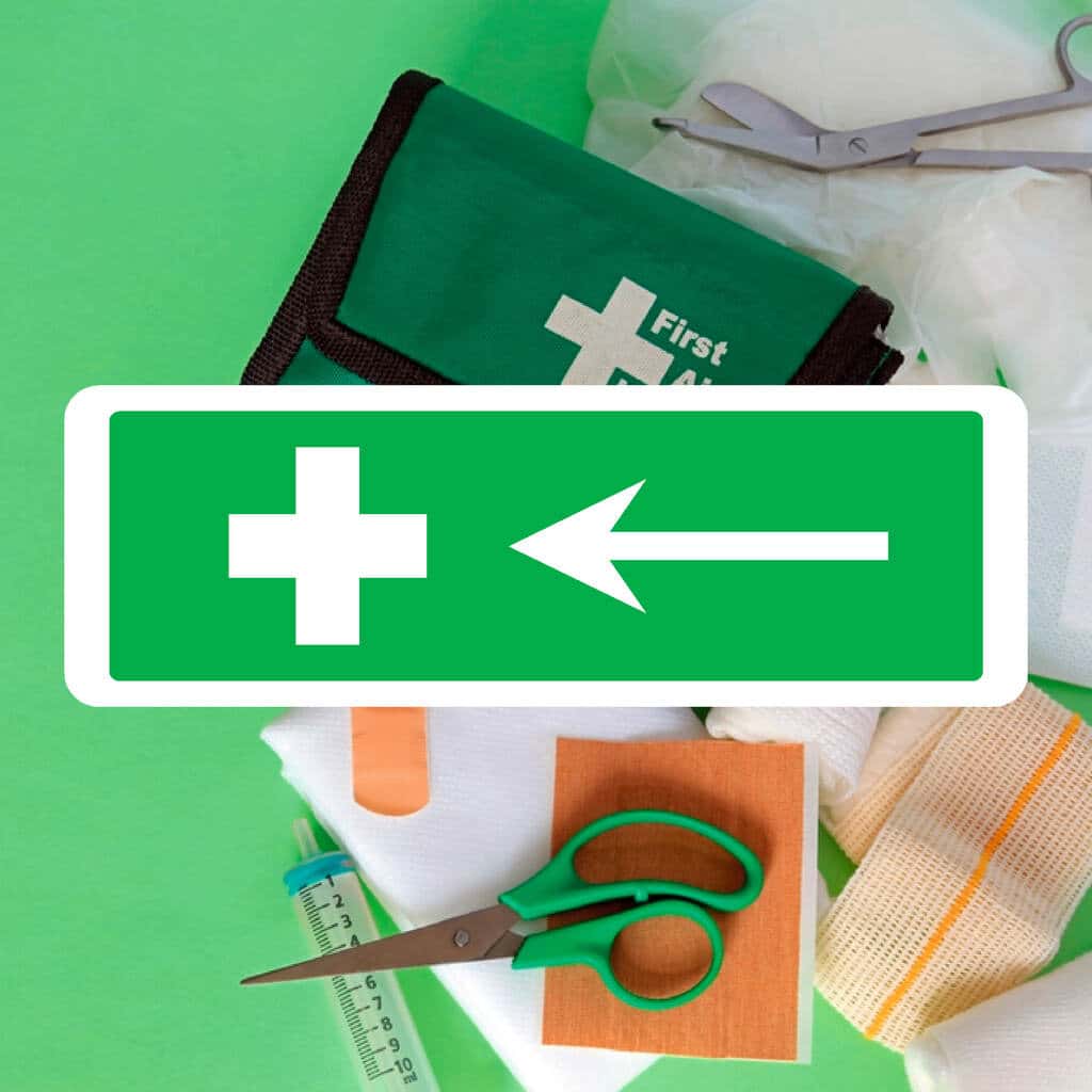 First Aid Sign With Left Arrow